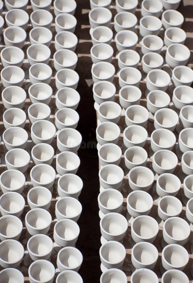 Rows of White Cups from Clay Stock Image - Image of glassful, small ...
