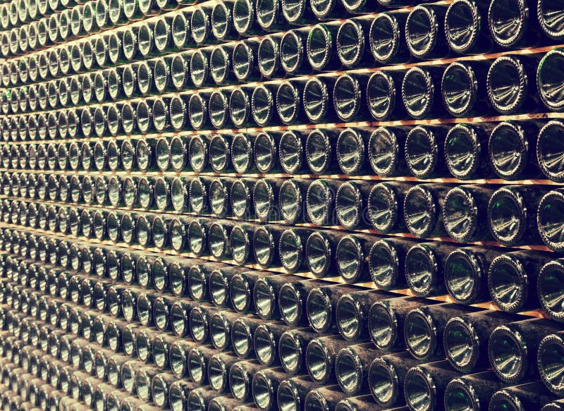 Rows of Wine Bottles in Winery Stock Photo - Image of dark, fluid: 80721708
