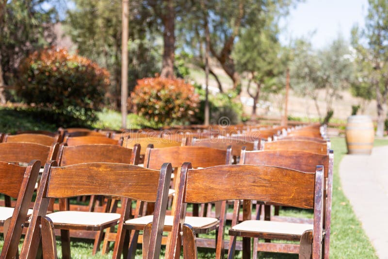 Rows of Wooden Event Chairs at Wedding Venue Abstract Stock Photo ...
