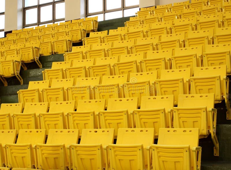 Rows of Yellow Seats stock photo. Image of seats, indoor - 27212610