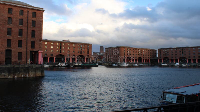 Royal Albert Dock Warehouse Under a Cloudy Sky in Liverpool, England ...