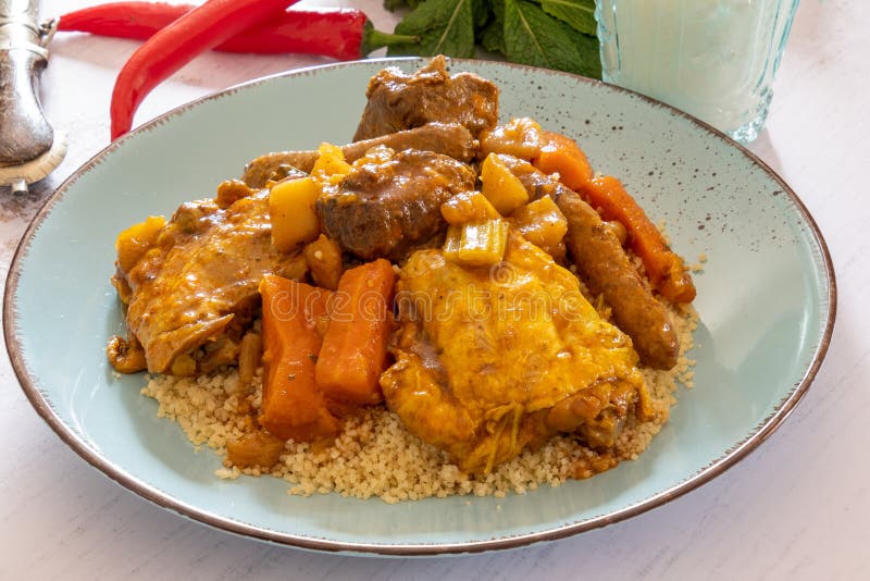 Royal Couscous in a Plate on a Table with a Glass of Milk Stock Image ...