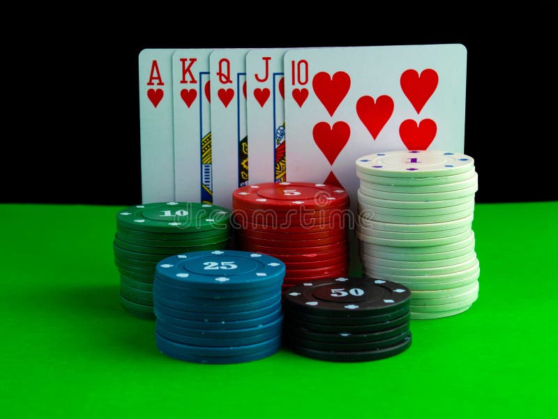 Royal Flush Cards and Poker Chips in Stacks on the Table Stock Image ...