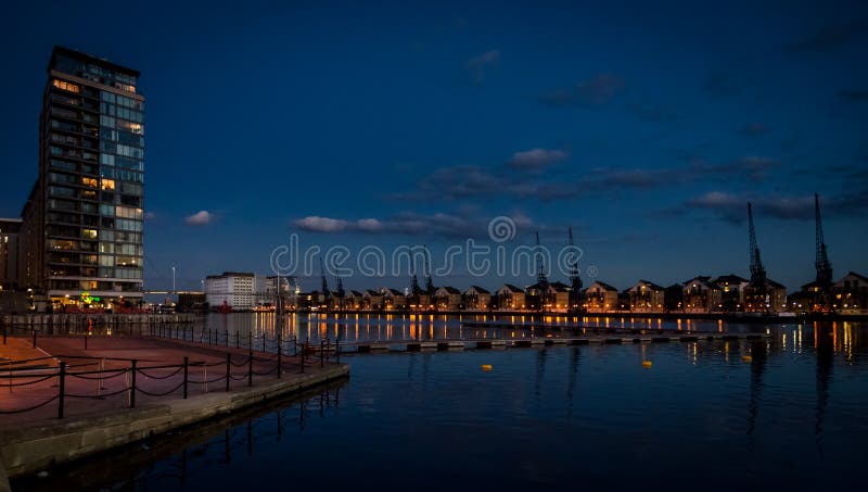 Royal Victoria Dock at Dusk Stock Photo - Image of houses, night: 33438276