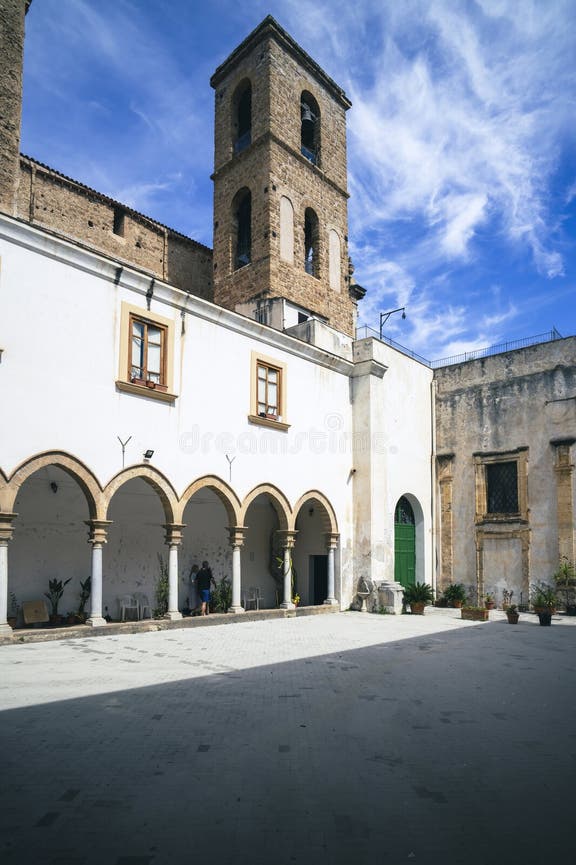 Exploring the Historic Courtyard of an Ancient Italian Building with a ...
