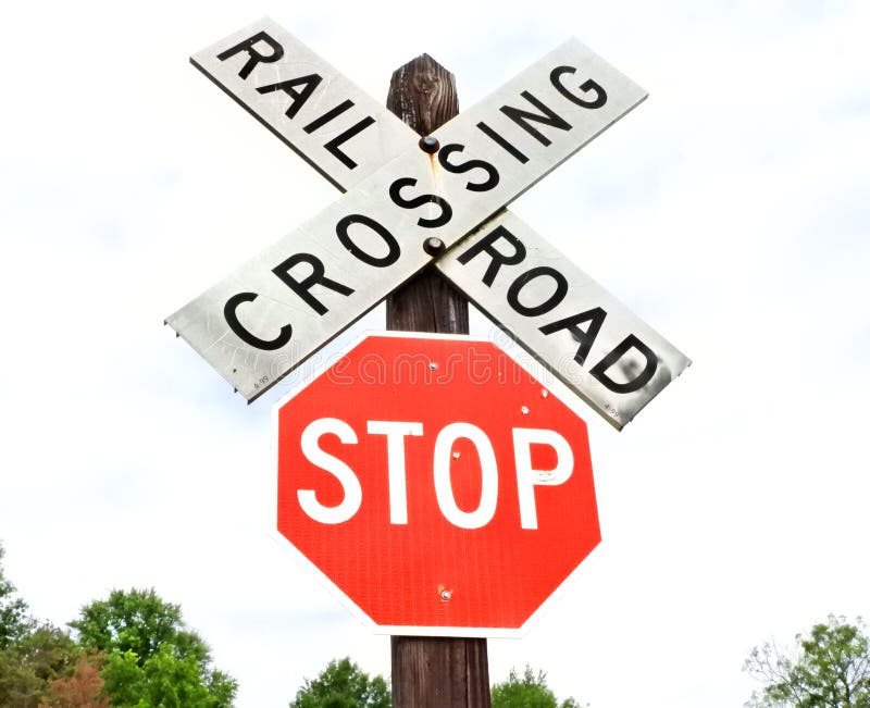 Railroad Train Crossing and Red Stop Sign Stock Photo - Image of boards ...