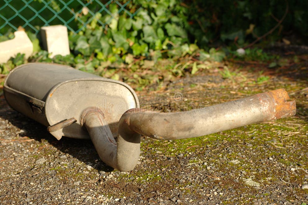 Rrusty exhaust from a car stock photo. Image of rust - 48810638