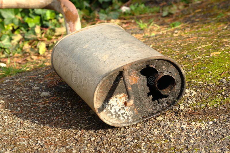 Rrusty exhaust from a car stock photo. Image of rust - 48810654
