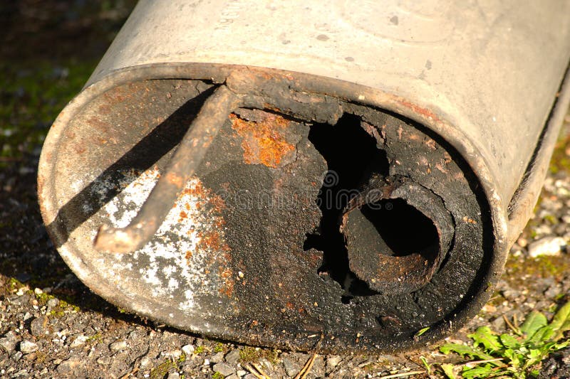 Rrusty exhaust from a car stock photo. Image of carbon - 48810684