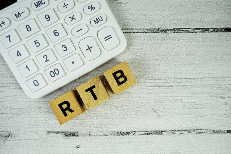 RTB (Real Time Bidding) Text with Alarm Clock and Calculator on Wooden ...