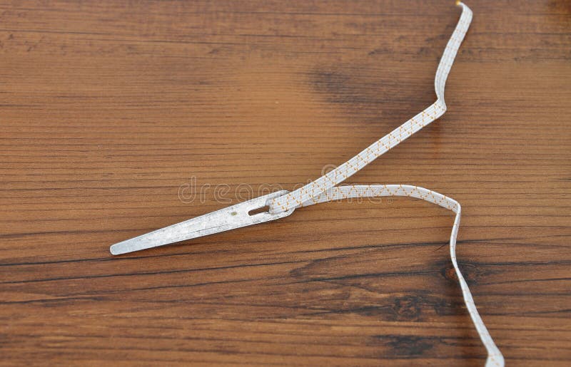Rubber Band and Insertion Tool Stock Photo - Image of dark, brown: 73175020