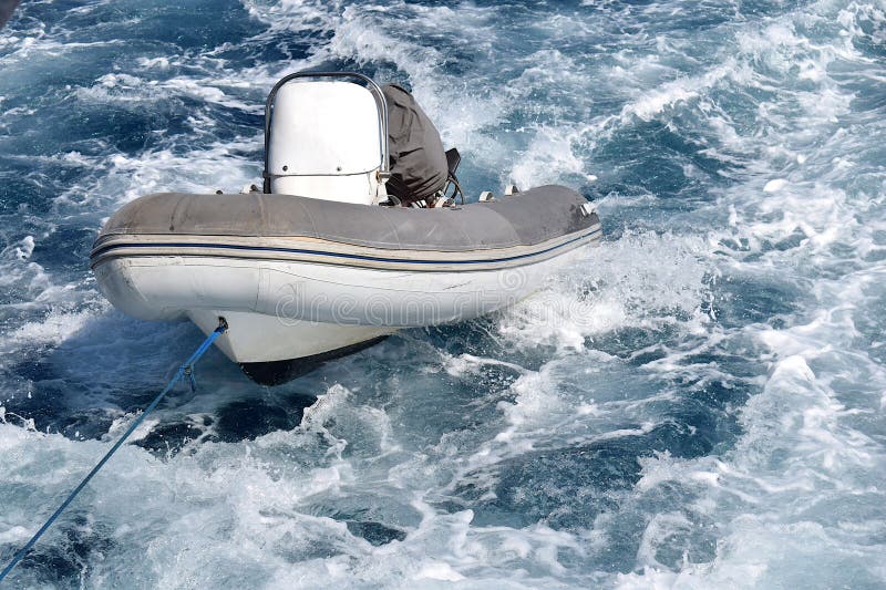 Rubber Boat in the Fairway of the Tug Stock Photo - Image of foam ...