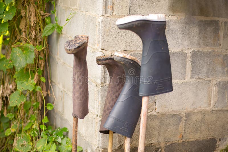 Rubber boots hanging stock photo. Image of asia, color - 322491976