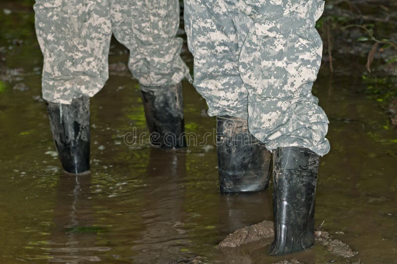 Rubber boots in the mud stock photo. Image of swamp, military - 34216142