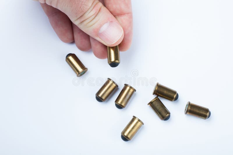 Bullets in hand stock photo. Image of security, brass - 13244514