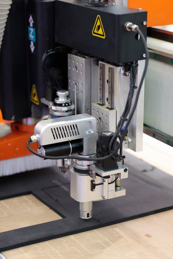 Rubber Cutting with CNC Digital Cutting Machine Stock Photo - Image of ...