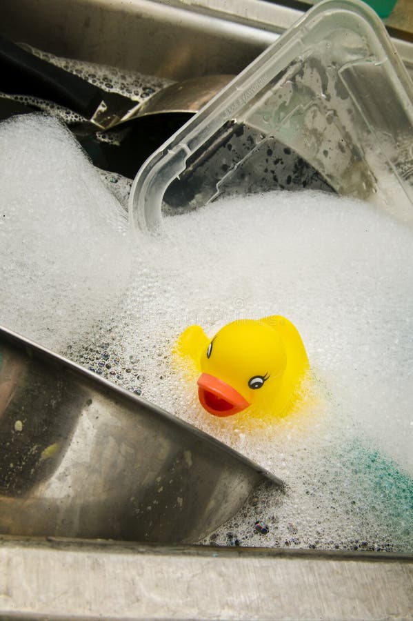Rubber Duck In Kitchen Sink Stock Image - Image of sink, pots: 31843575