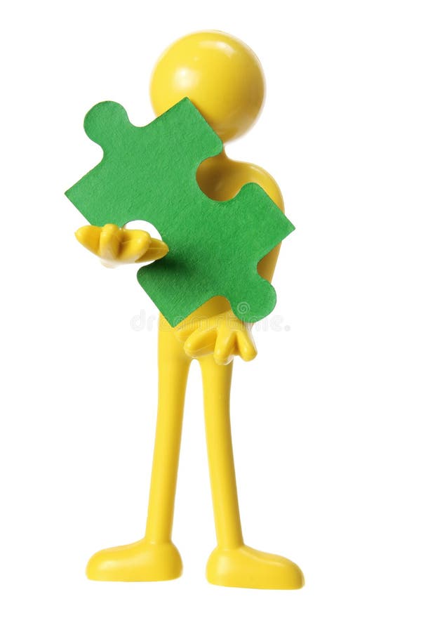 Rubber Figure with Piece of Jigsaw Puzzle Stock Photo - Image of match ...