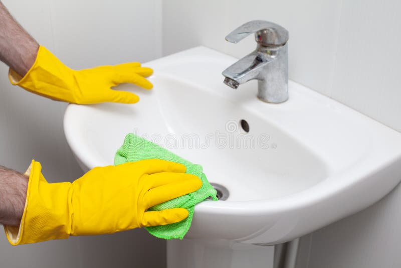Rubber Gloved Hand Cleaning Sink with Duster Stock Photo - Image of ...