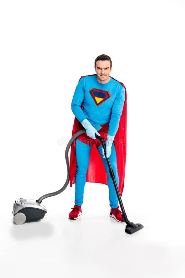 Superman in Rubber Gloves Using Vacuum Cleaner and Smiling at Camera ...
