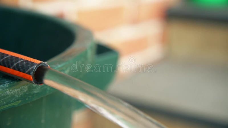 From the Rubber Hose Comes the Water Flow HD 1920x1080 Stock Footage ...