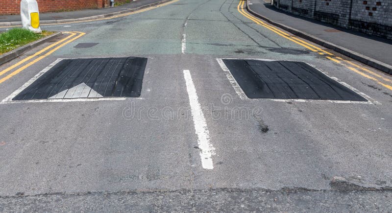 Rubber Road Bumps, Humps in the Middle of the Road Stock Photo - Image ...