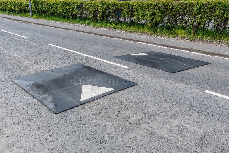 Rubber Road Bumps, Humps in the Middle of the Road Stock Image - Image ...