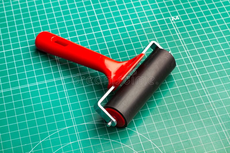 Rubber Roller for Engraving on a Green Cutting Matt Stock Image - Image ...
