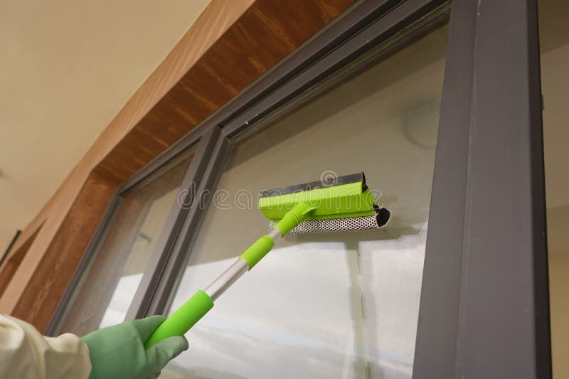 Rubber Squeegee Cleans a Soaped Window. Stock Photo - Image of hygiene ...