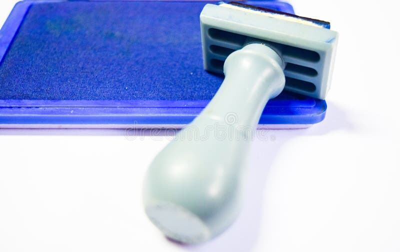 Rubber Stamp and Blue Ink Box Isolated on White Stock Photo - Image of ...