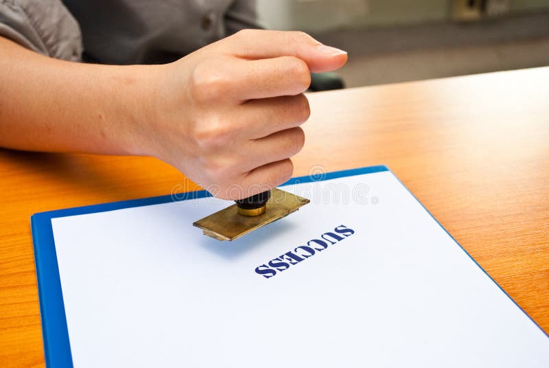 Rubber stamp on hand stock photo. Image of bureau, kick - 15451456