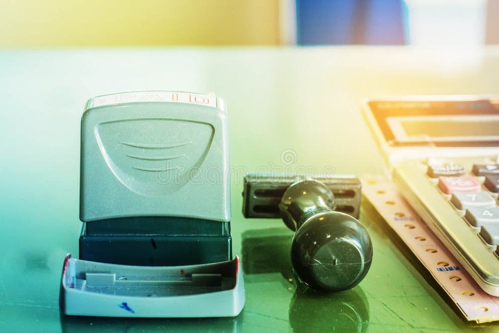 Rubber stamps on the table stock image. Image of office - 77591167