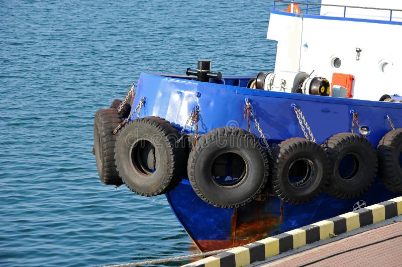 Tyre fender on tugbooat stock photo. Image of nautical - 104697716