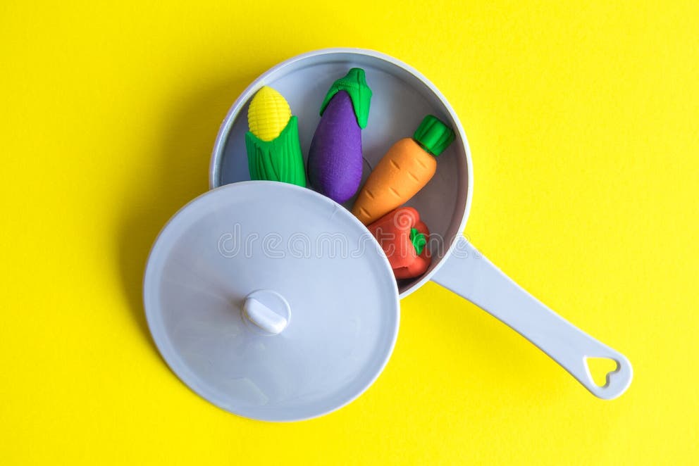 Rubber Vegetables in Plastic Pan Minimal Creative Concept. Stock Image ...