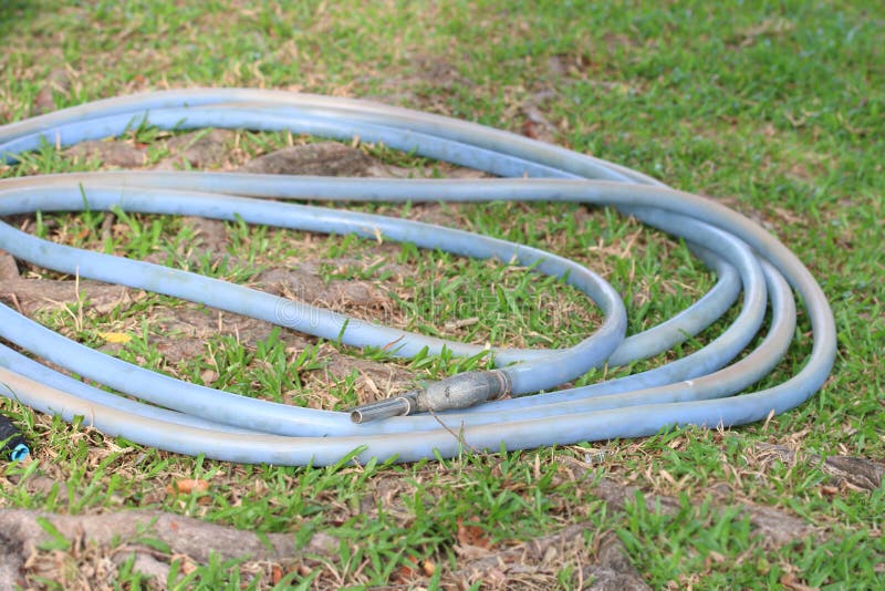 Rubber water tube. stock image. Image of long, sprinkler - 61981261