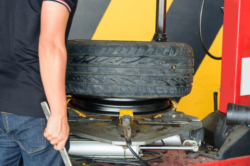 Rubber Wheel Machine/ Tire Changer Machine Stock Photo - Image of ...