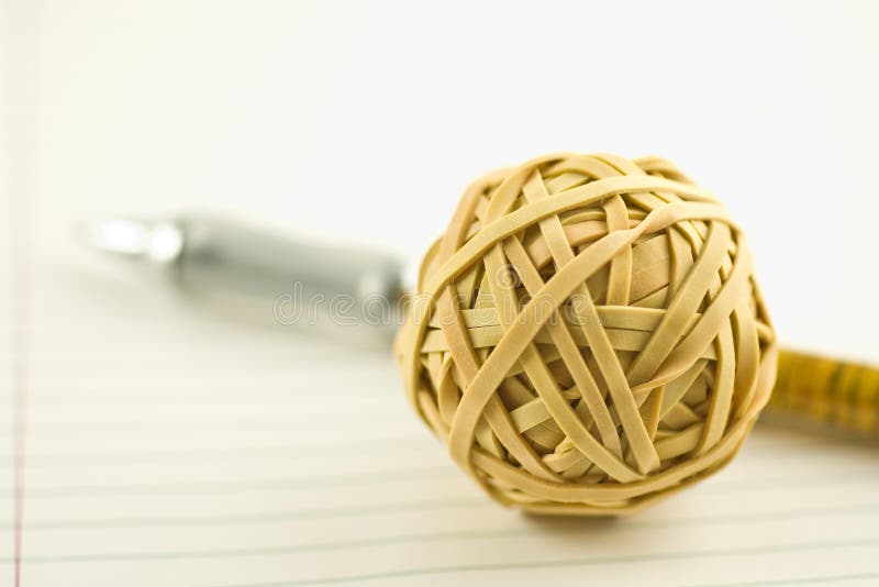Rubberband Ball and Pen stock photo. Image of writing - 4913622