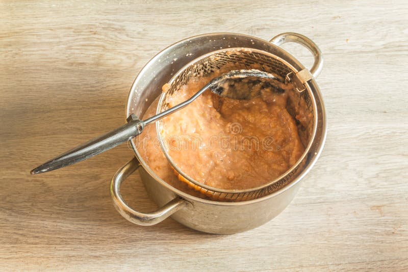 Rubbing Applesauce through a Sieve Stock Image - Image of food, organic ...