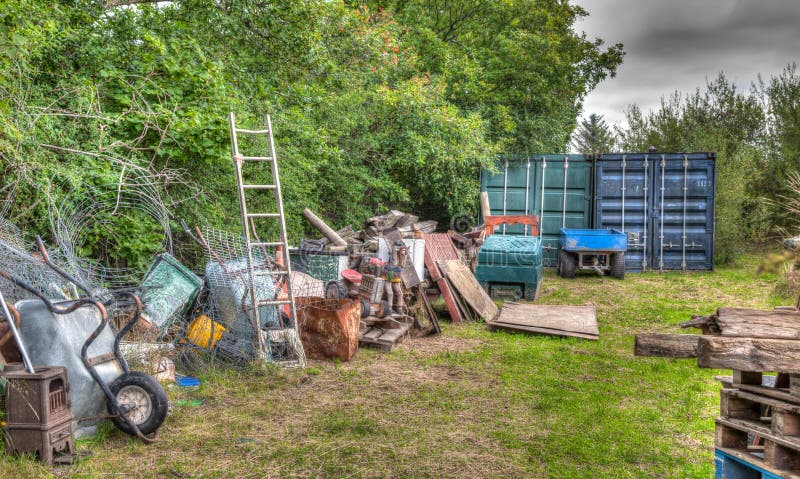 Homemade Old Concrete Garden Shed with Discarded Backyard Junk in Front ...
