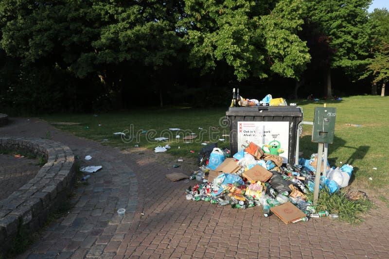 Rubbish Next To Rubbish Bin in Park Editorial Photo - Image of ...