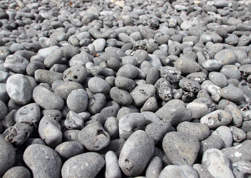 Rubble Beach Stones with Endless Perspective Background Stock Image ...