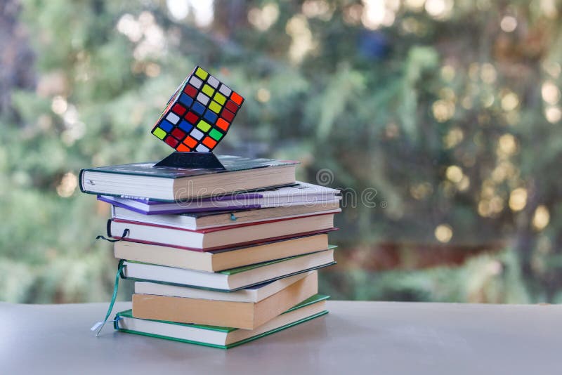 The Rubik S Cube is on the Books Editorial Image - Image of rubiks ...