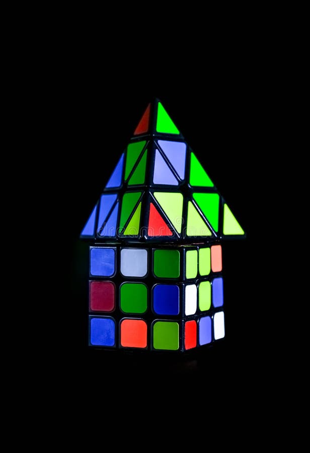 Rubik`s Cube and Triangular Rubik`s Cube on Black Background ...