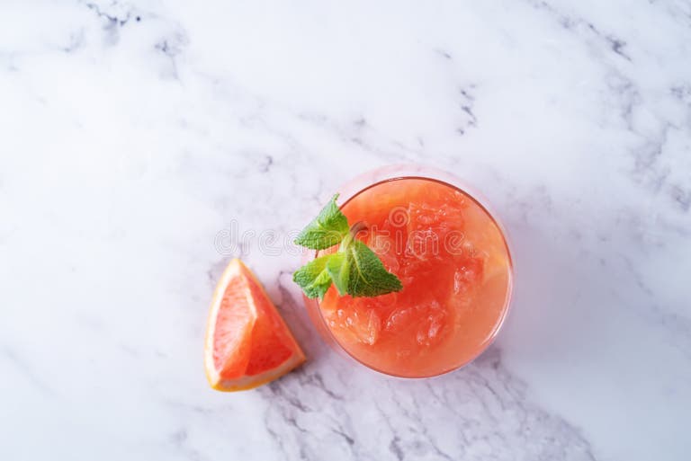 Ruby Red Grapefruit Cocktail with Mint Leaves in Glasses Stock Image ...