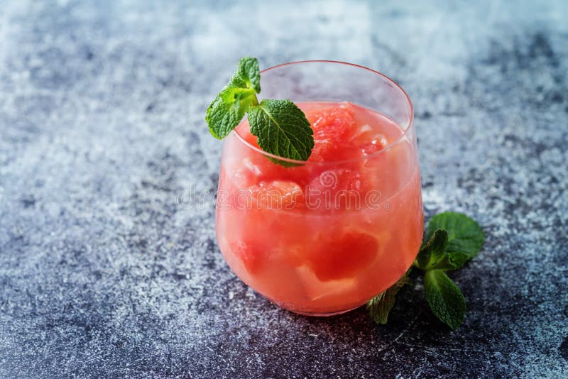 Ruby Red Grapefruit Cocktail with Mint Leaves in Glasses Stock Image ...