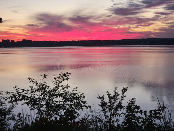 Ruby tinged sunrise stock photo. Image of sunset, afterglow - 250542054