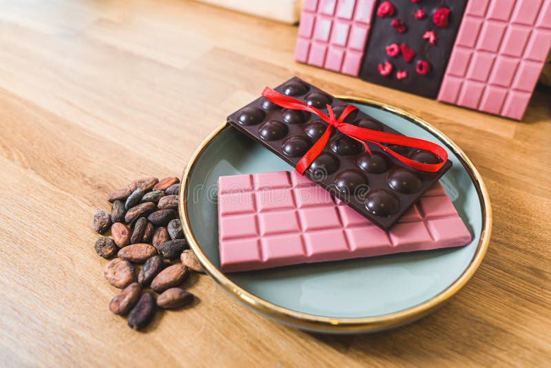 Ruby White and Dark Chocolate Bar with Bow on Plate Fruit and Nuts ...
