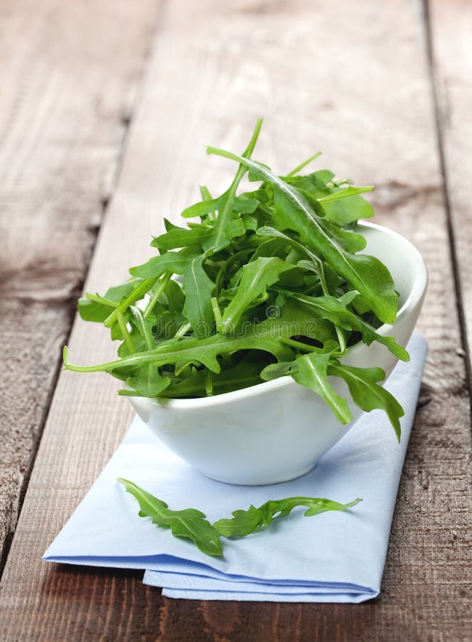Rucola in bowl stock photo. Image of rucola, bowl, salad - 17432364