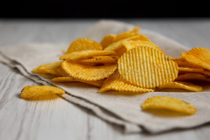 Ruffled Cheese Potato Chips, Side View Stock Photo - Image of food ...