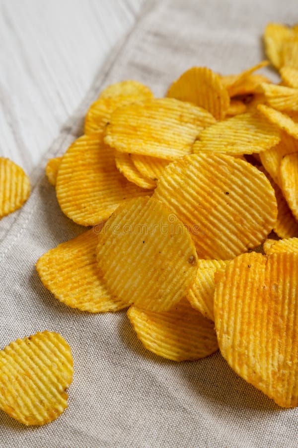 Ruffled Cheese Potato Chips, Side View. Close-up Stock Photo - Image of ...